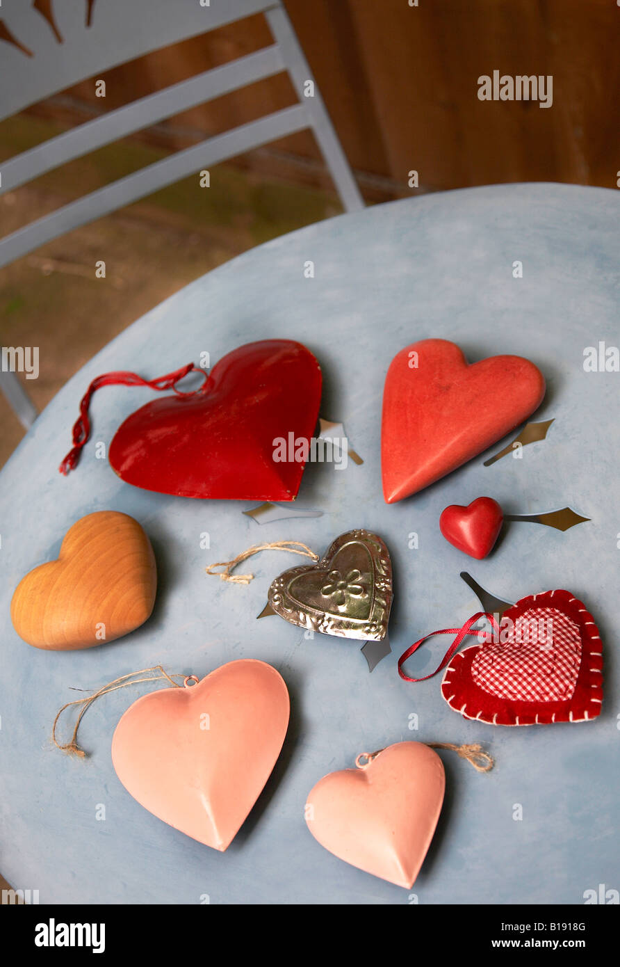Vintage hearts on a table Stock Photo - Alamy