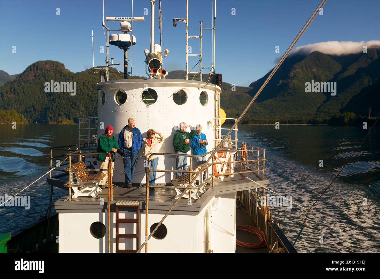 Passengers aboard MV Uchuck taking in the west coast scenery. Vancouver ...
