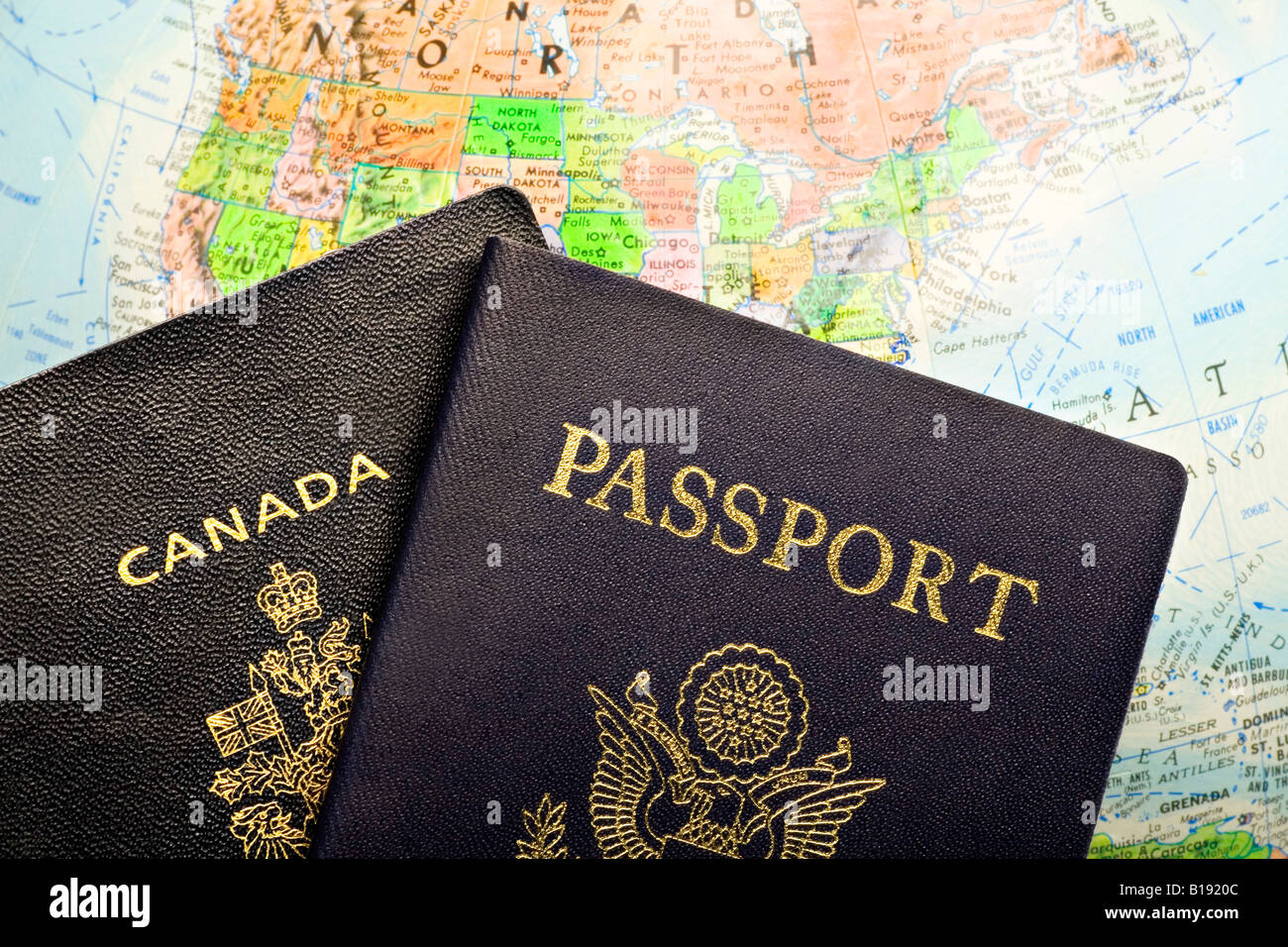 Passports laid over a map of North America Stock Photo - Alamy
