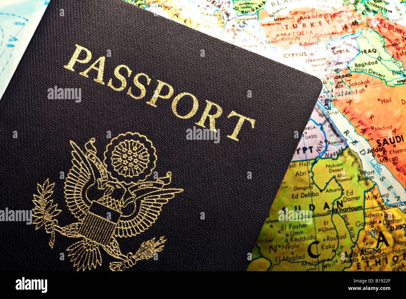 American Passport laid over a map Stock Photo - Alamy