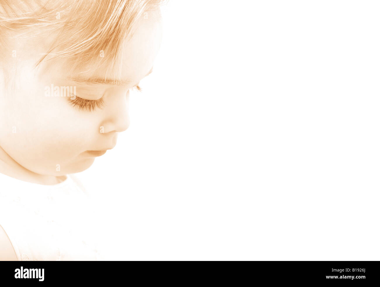 Child looking down Stock Photo - Alamy