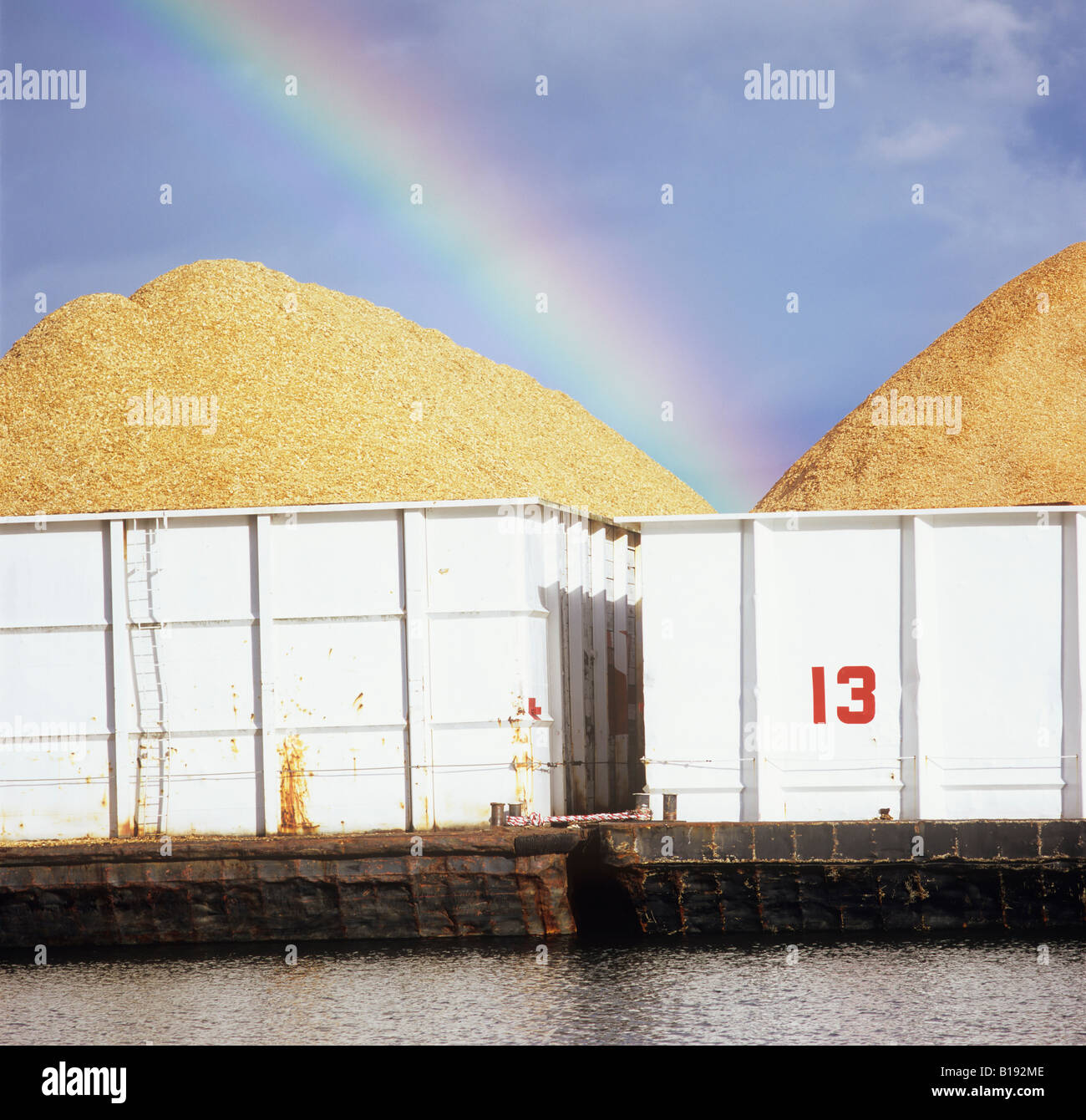 Rainbow and wood chip barges, Howe Sound, British Columbia, Canada ...