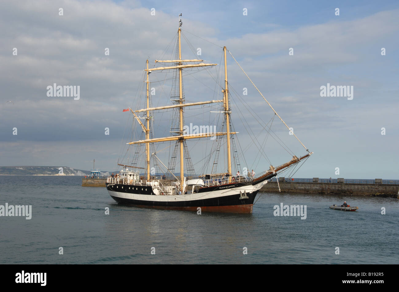 The tall ship "Pelican of London" sails into Weymouth Harbour in Dorset ...