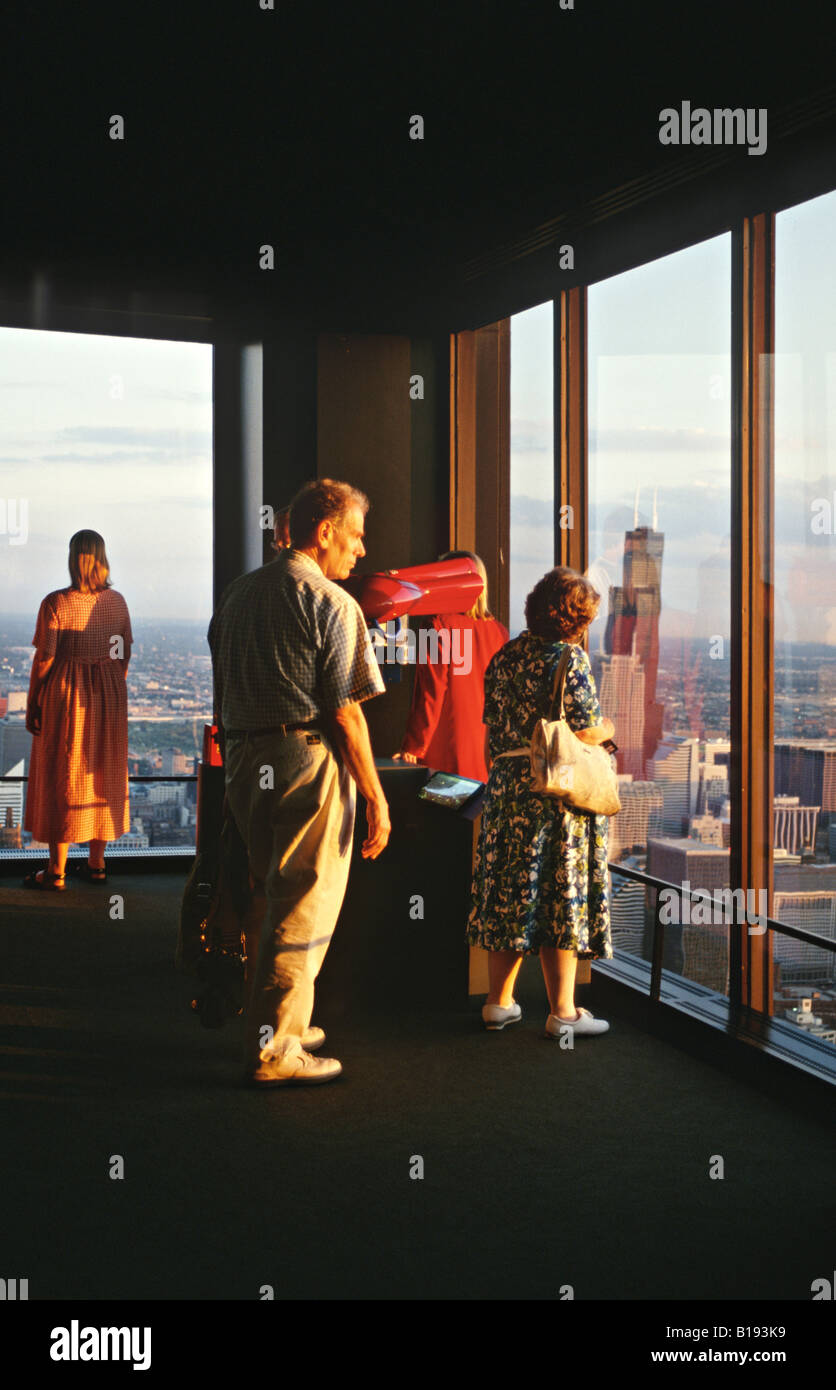 SKYLINE Chicago Illinois Observers watch sunset from John Hancock ...