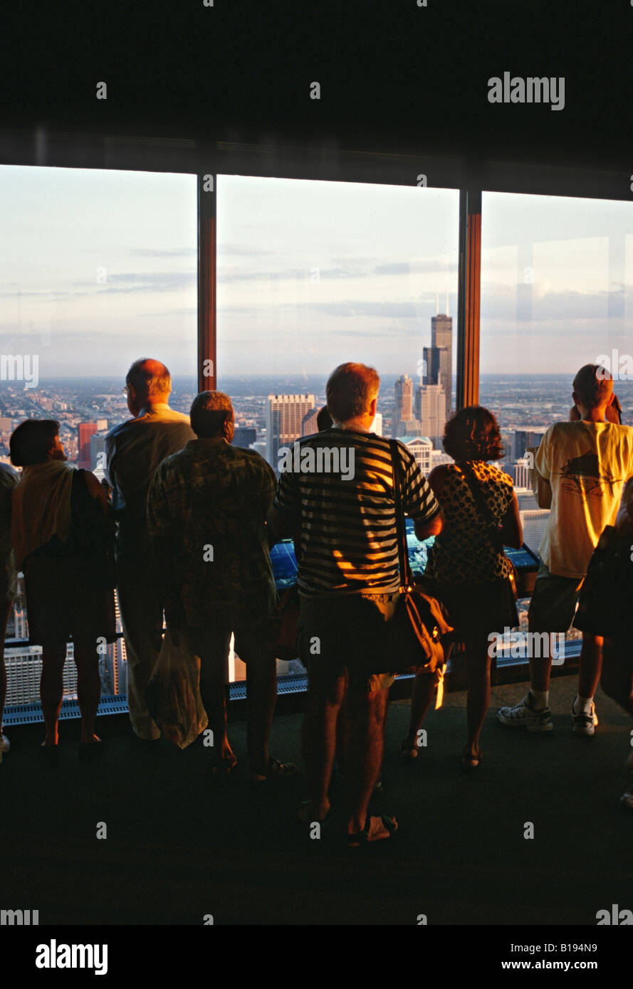 SKYLINE Chicago Illinois Observers watch sunset from John Hancock ...