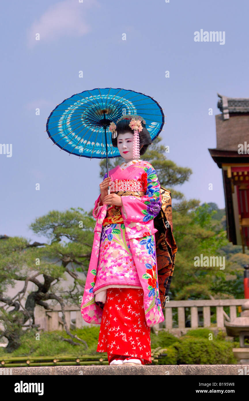 maiko apprentice geisha with umbrella at Kiyomizu Temple Kyoto Japan ...