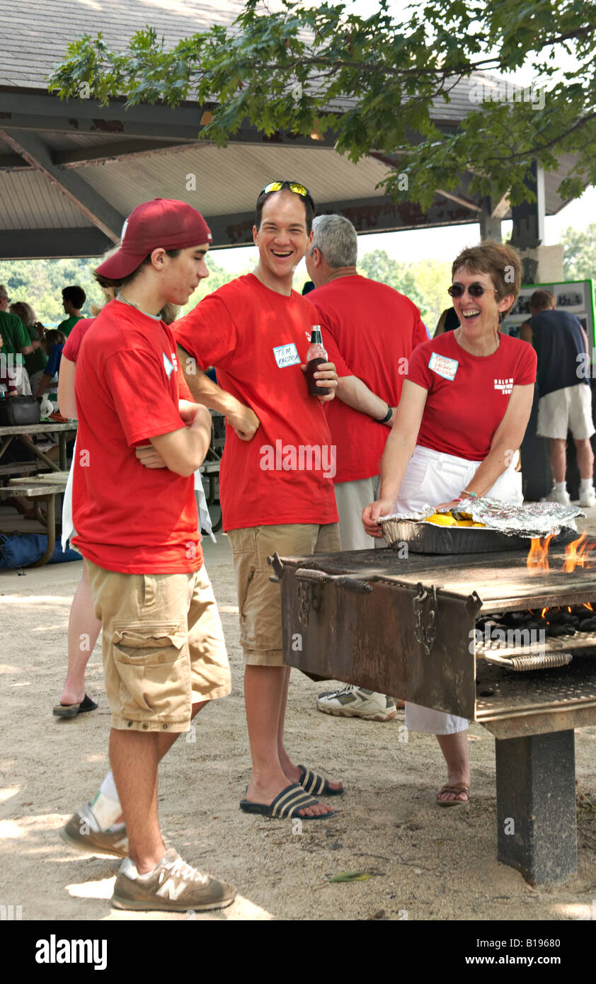 PRESERVES Wauconda Illinois Family members with name tags cook food on ...