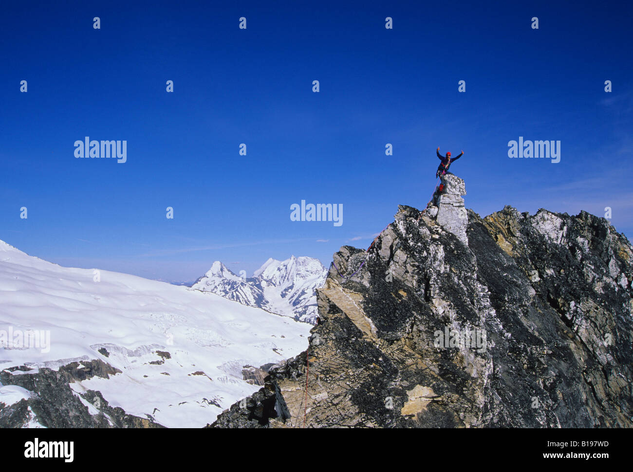 Man on the summit of Mount Smart, Glacier National Park, British ...