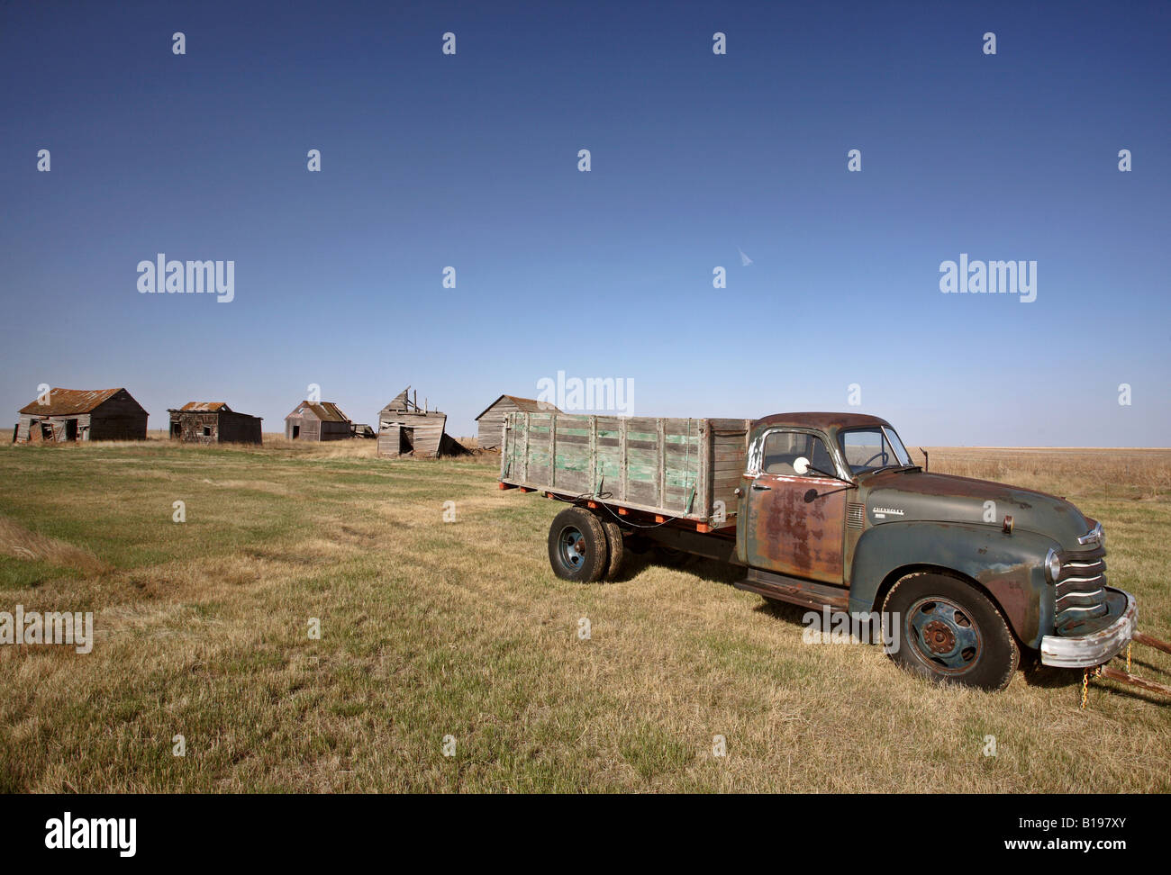 Antique Chevy farm truck in old farmyard Stock Photo - Alamy