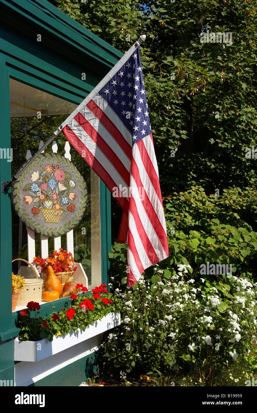 American flag in store front hi-res stock photography and images - Alamy