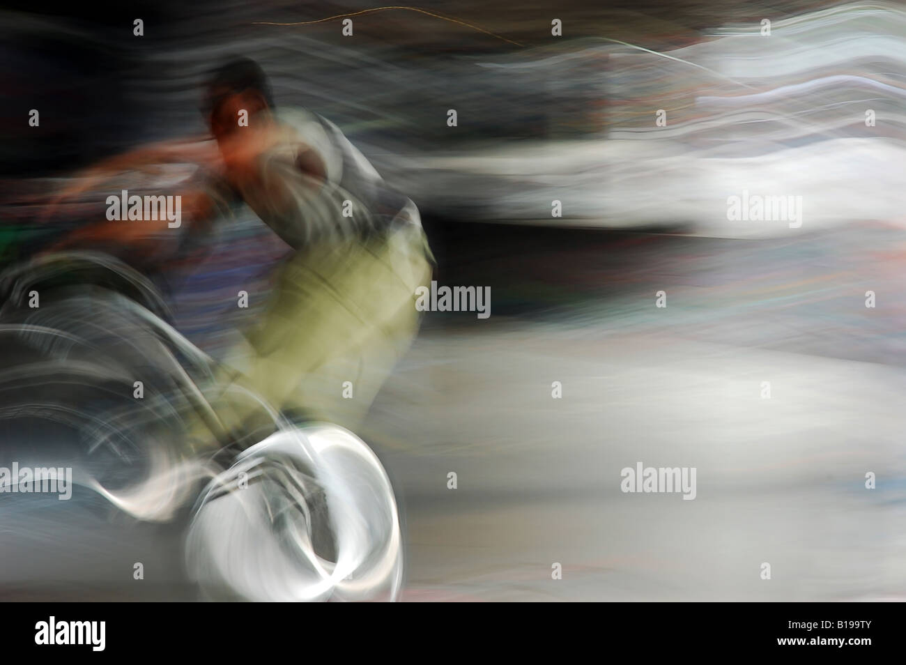 Picture Art of a Biker doing stunts Stock Photo - Alamy