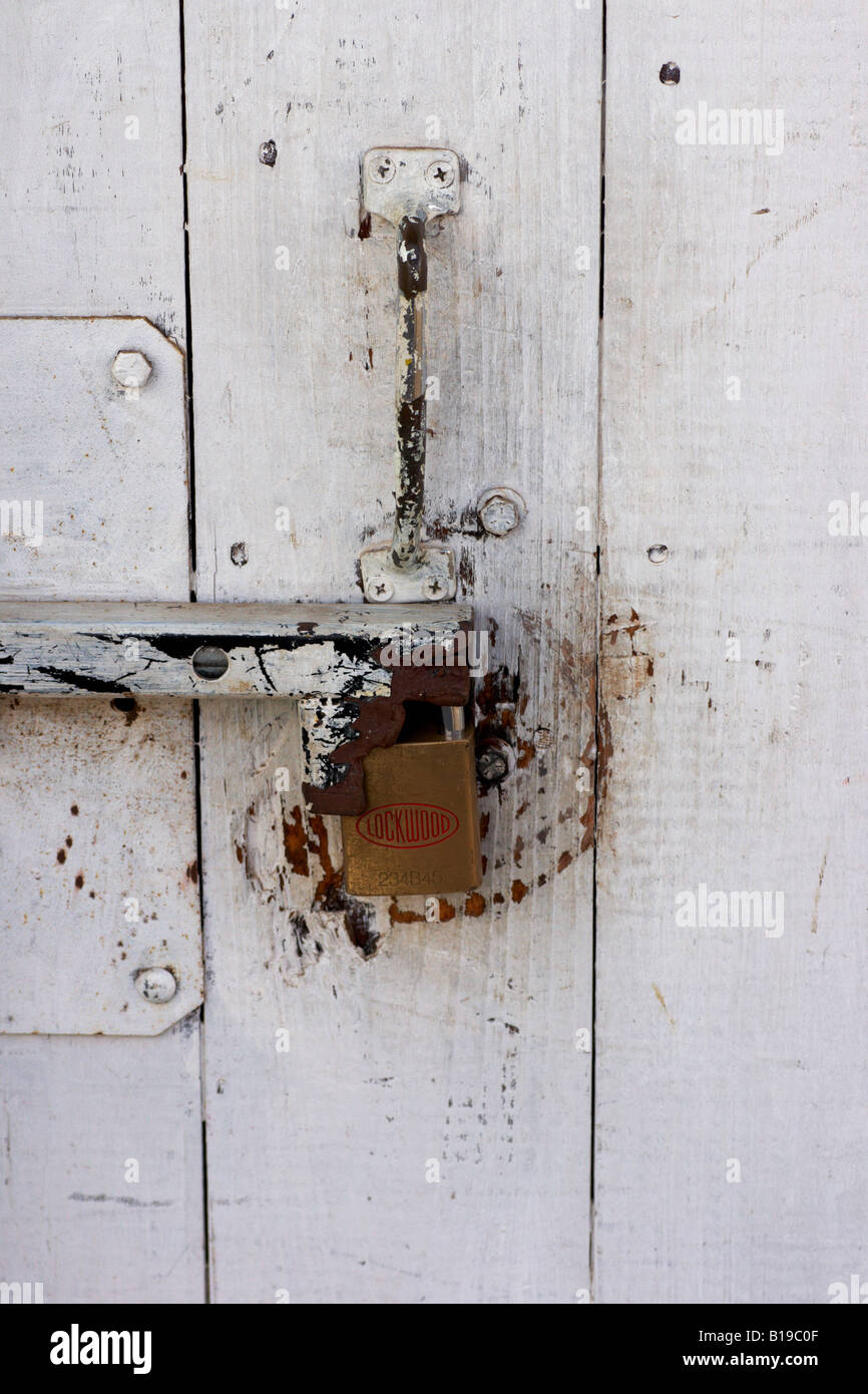 A pad lock on a door Stock Photo - Alamy