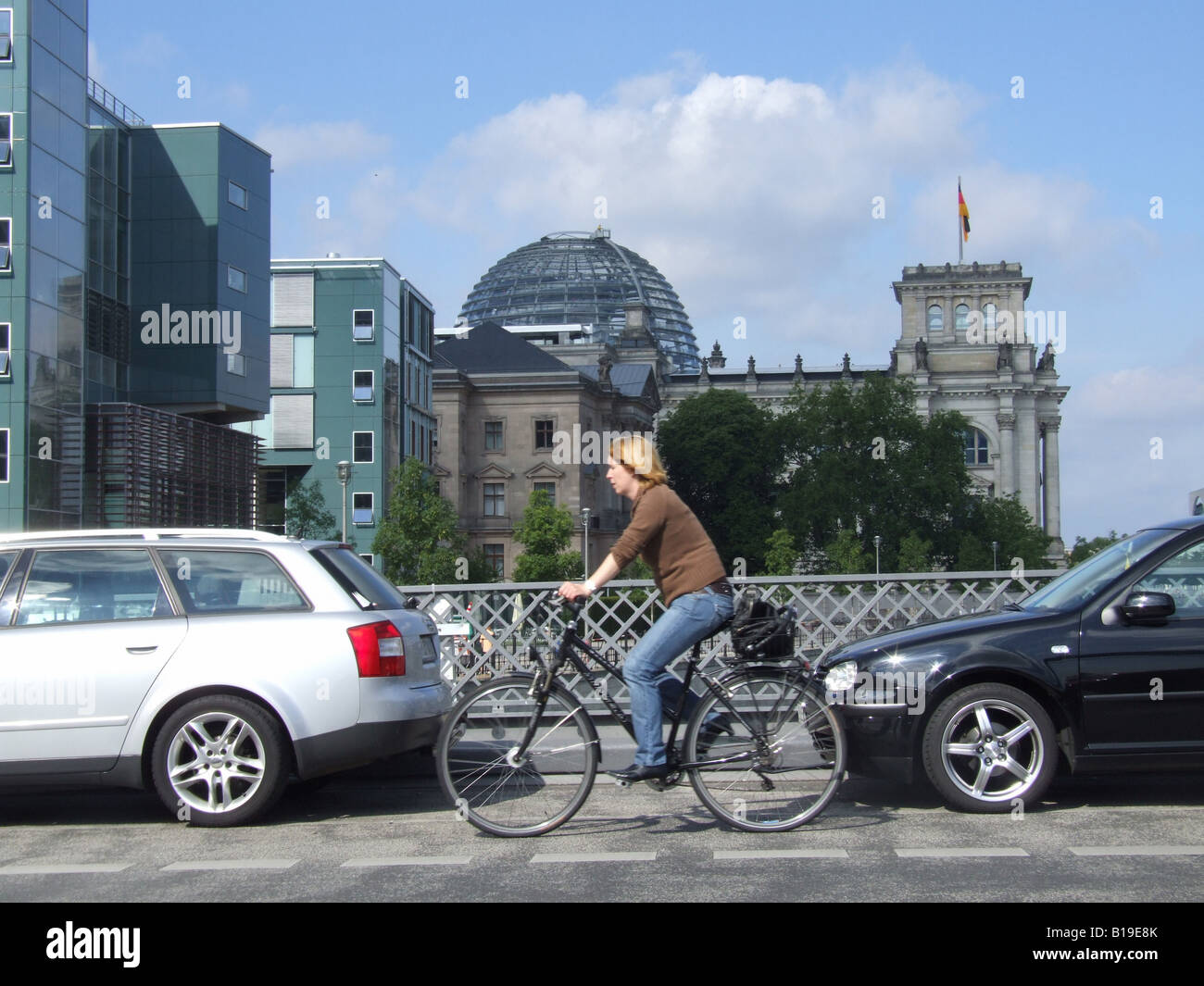 person riding bike reichstag dome, berlin, germany Stock Photo - Alamy