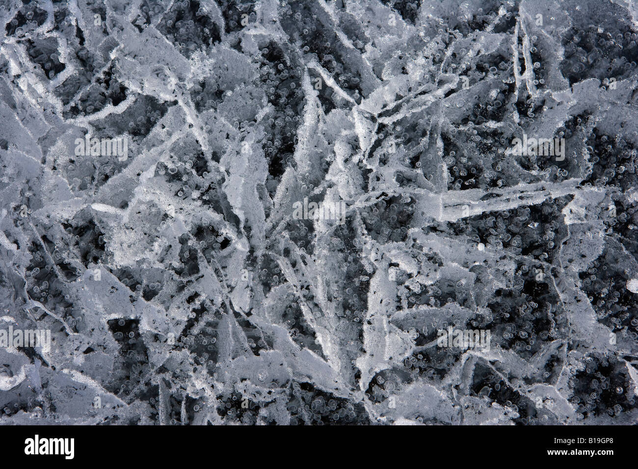 Norway, Troms, Lyngen Alps. The constant freezing and re-freezing of ...