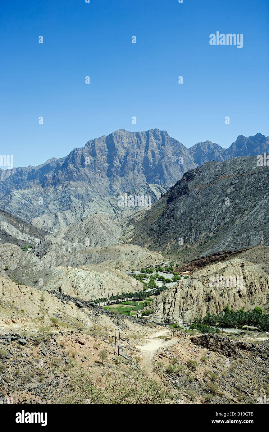 Oman, Western Hajar Mountains. West of the coastal areas lies the ...