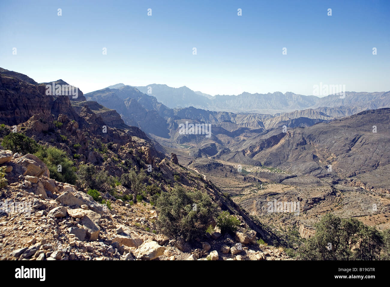 Oman, Western Hajar Mountains. West of the coastal areas lies the ...