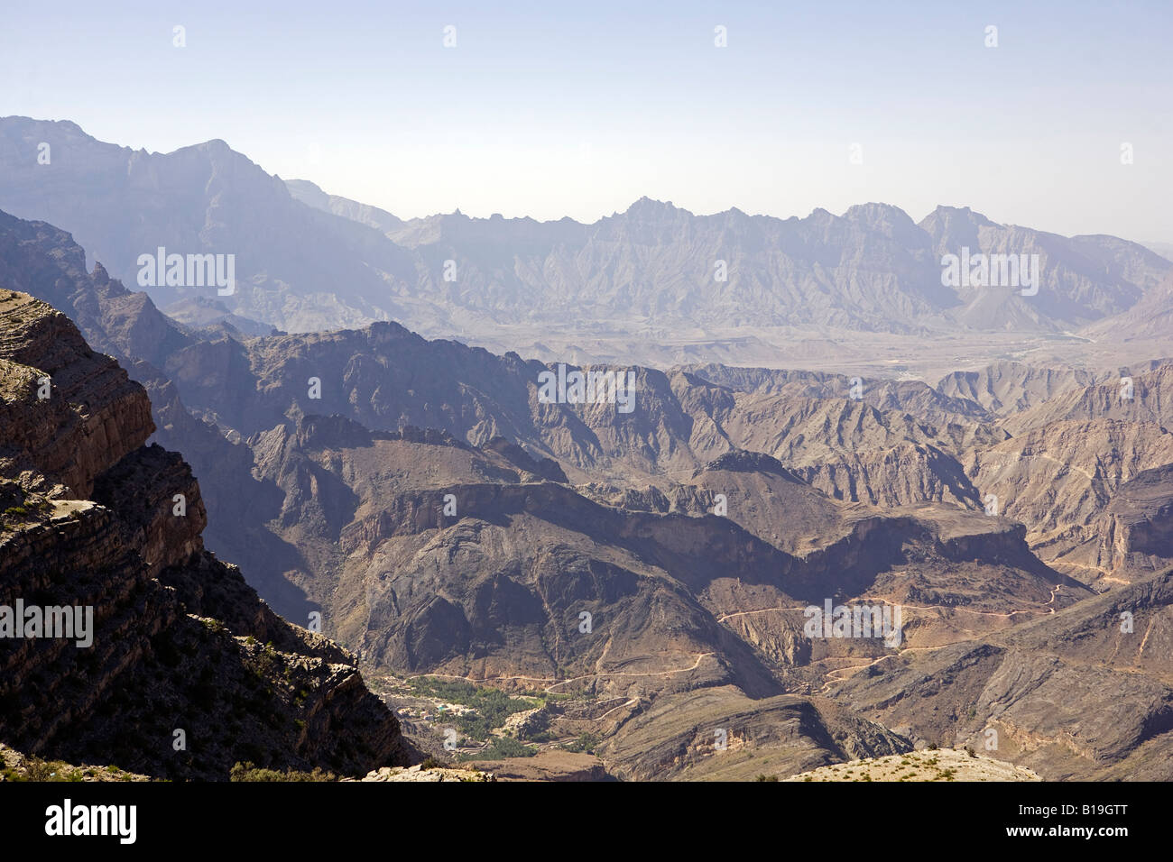 Oman, Western Hajar Mountains. West of the coastal areas lies the ...