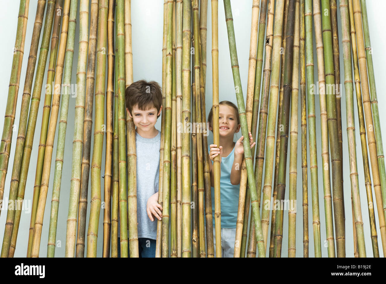 Child hiding behind pole hi-res stock photography and images - Alamy