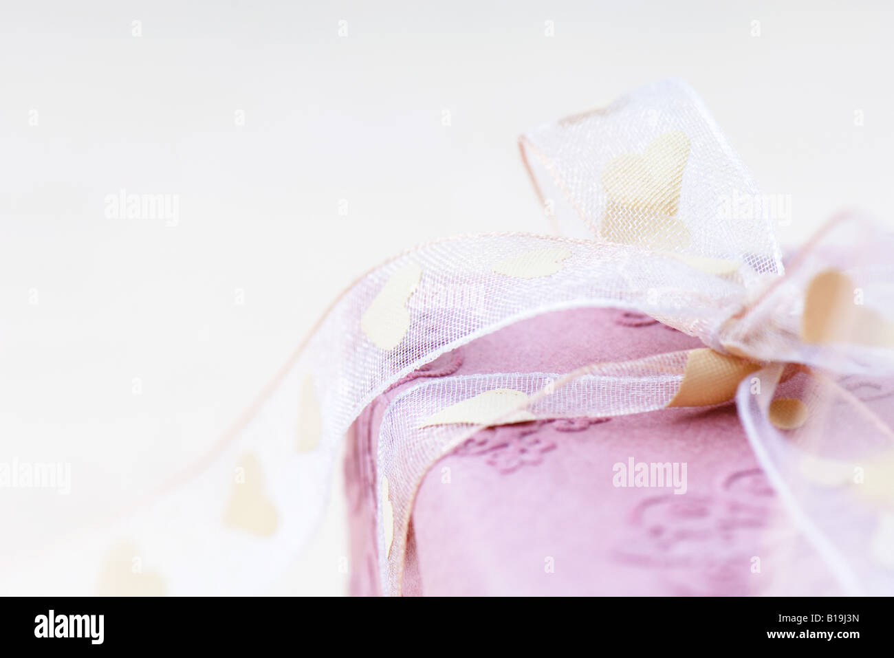 Wrapped gift, close-up Stock Photo - Alamy