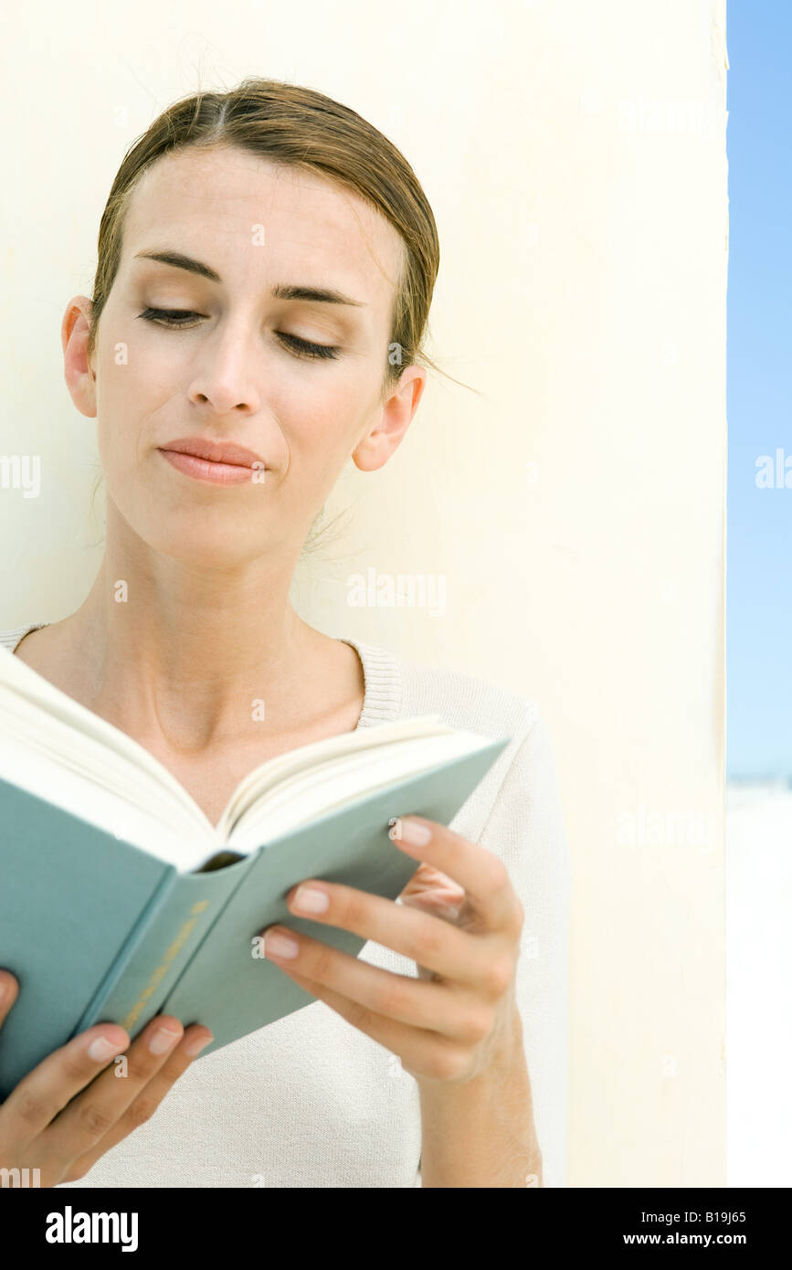 Woman reading book partial hi-res stock photography and images - Alamy
