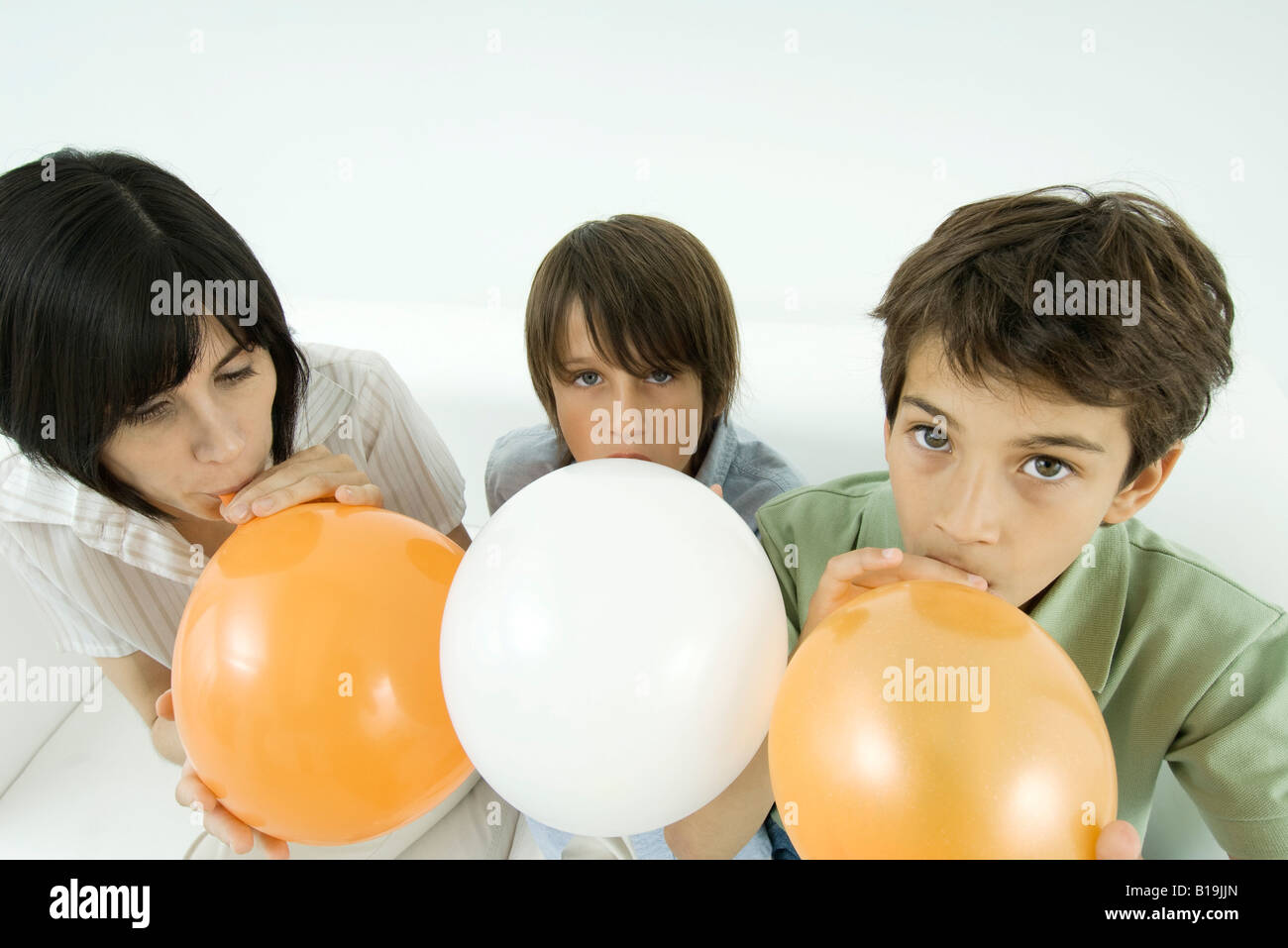 Kids inflating balloons hi-res stock photography and images - Alamy
