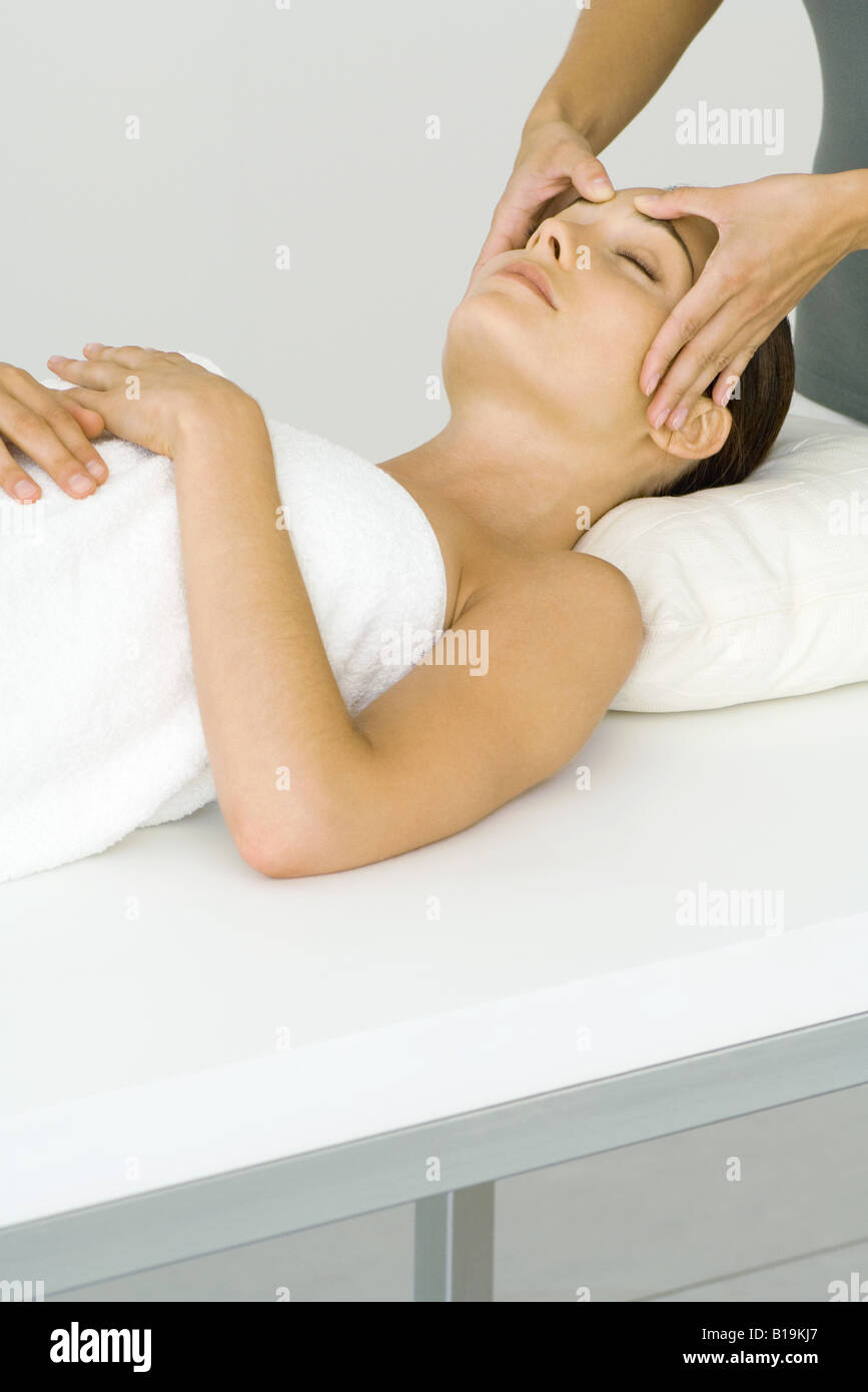 Woman receiving head massage, cropped view Stock Photo - Alamy