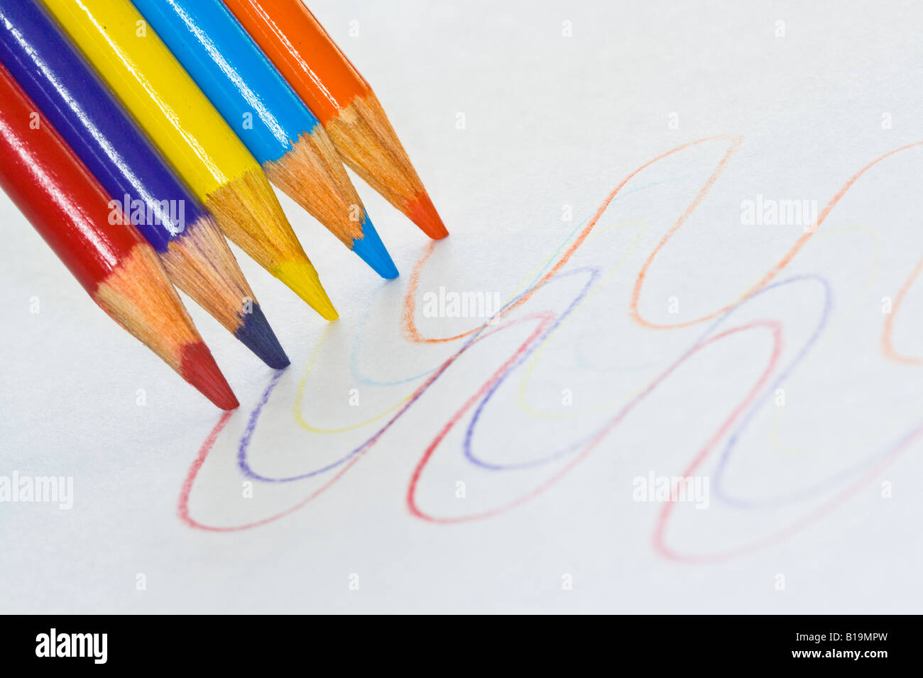 Colored pencils drawings squiggly lines on paper Stock Photo - Alamy