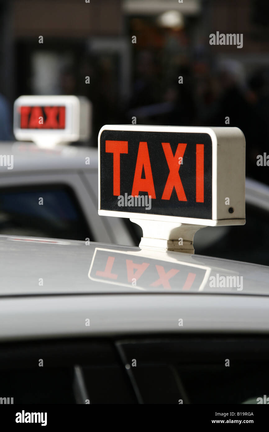 two taxis at taxi rank in rome, italy Stock Photo - Alamy