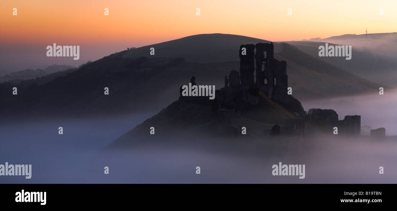 Mist surrounds the ruins of Corfe Castle Dorset England Stock Photo - Alamy