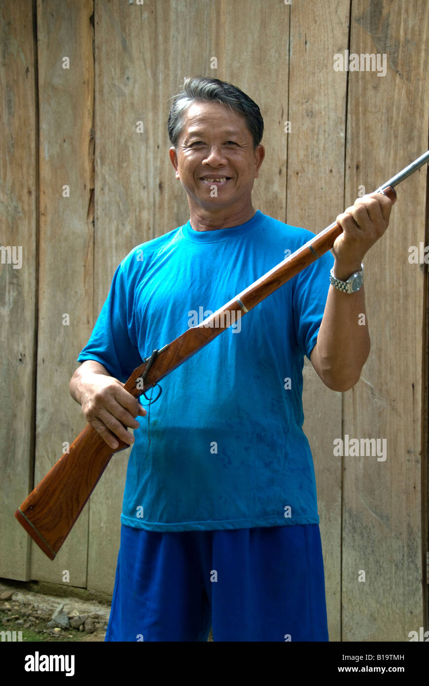 Gunsmith with a rifle he s made Stock Photo - Alamy