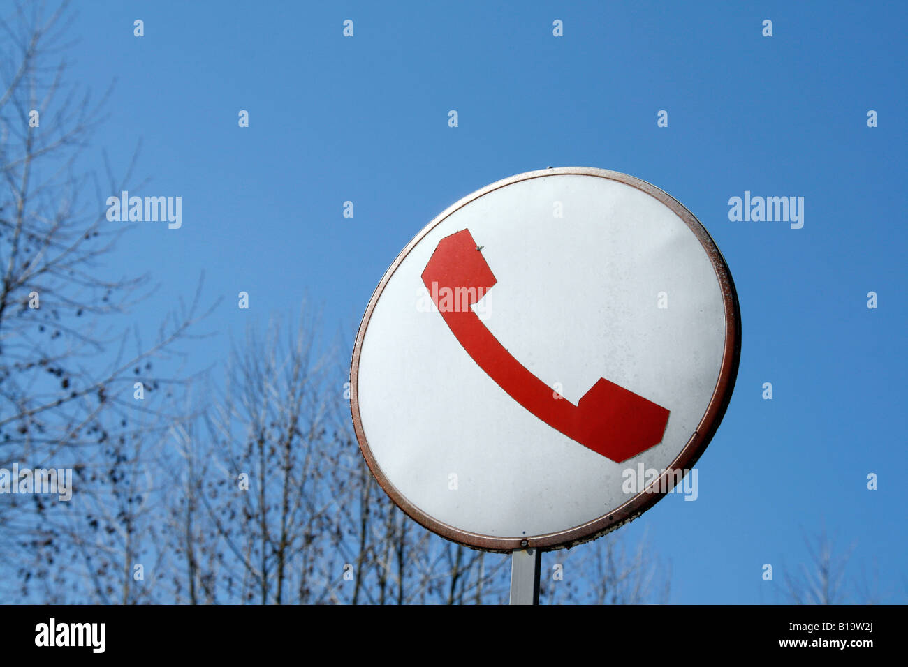 public telephone sign notice outside in sun Stock Photo - Alamy