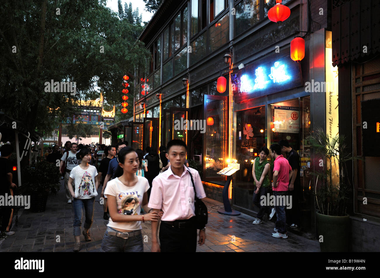 Tourists walk past restaurants at Lake Houhai in Night Beijing China ...