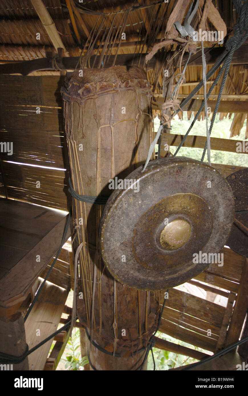 A war drum and gong in a bidayuh head house Stock Photo - Alamy