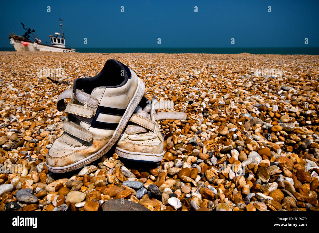 Shoes left on the beach hi-res stock photography and images - Alamy