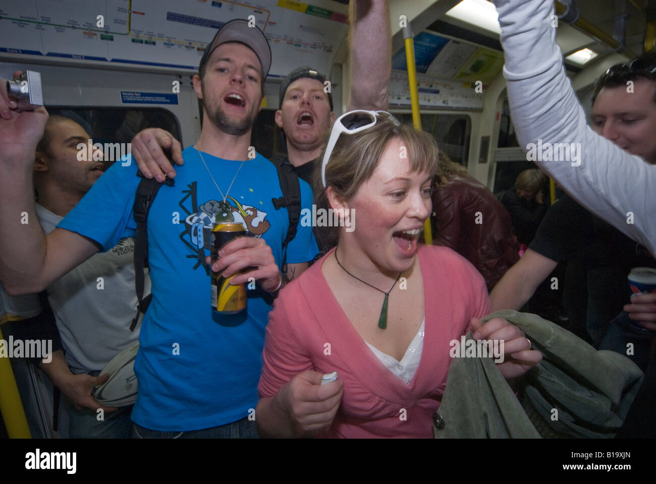 New Zealanders partying in an underground train carriage during the ...