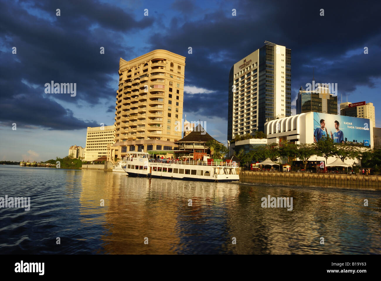 The MV equatorial tourist boat passing Kuching city at sunset Stock ...