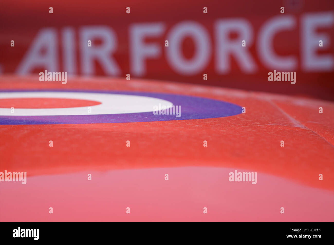 WING AND FUSELAGE OF A RED RAF HAWK AIRCRAFT SHOWING AIR FORCE DECAL ...