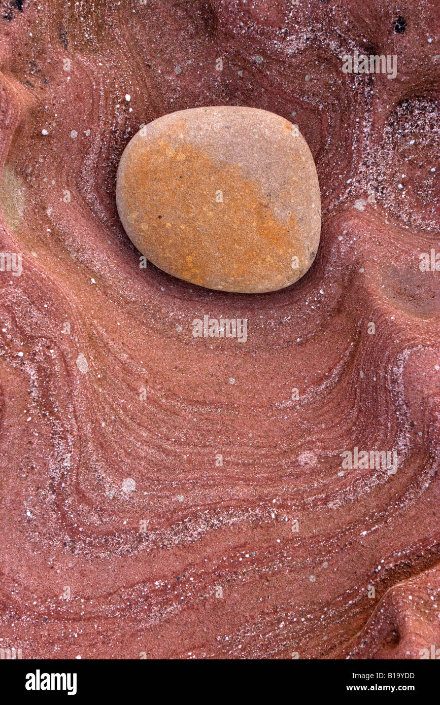 Rock Sculpture - red stone with white pebble - close up Stock Photo - Alamy