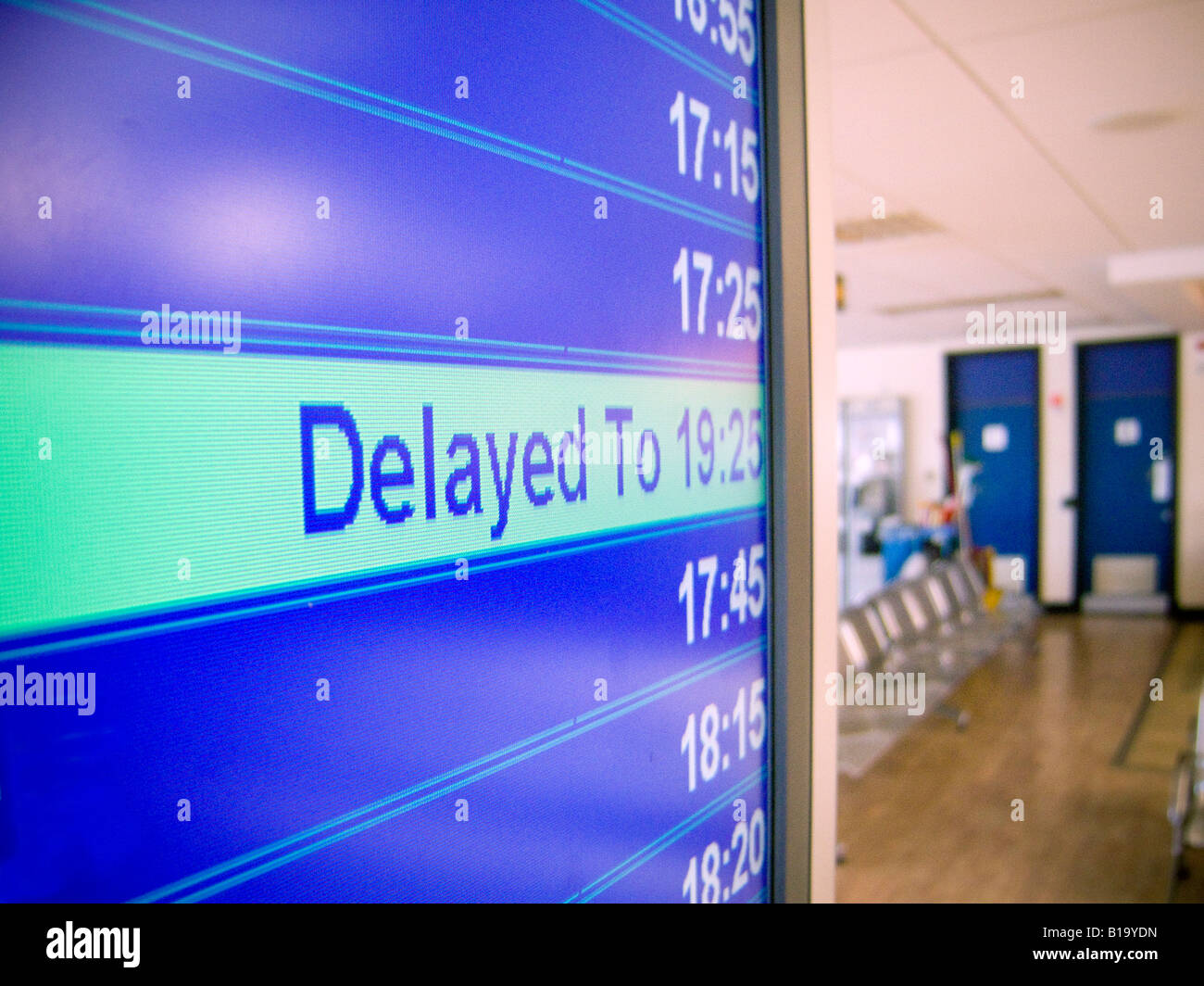 Flight delayed information at an airport Stock Photo - Alamy