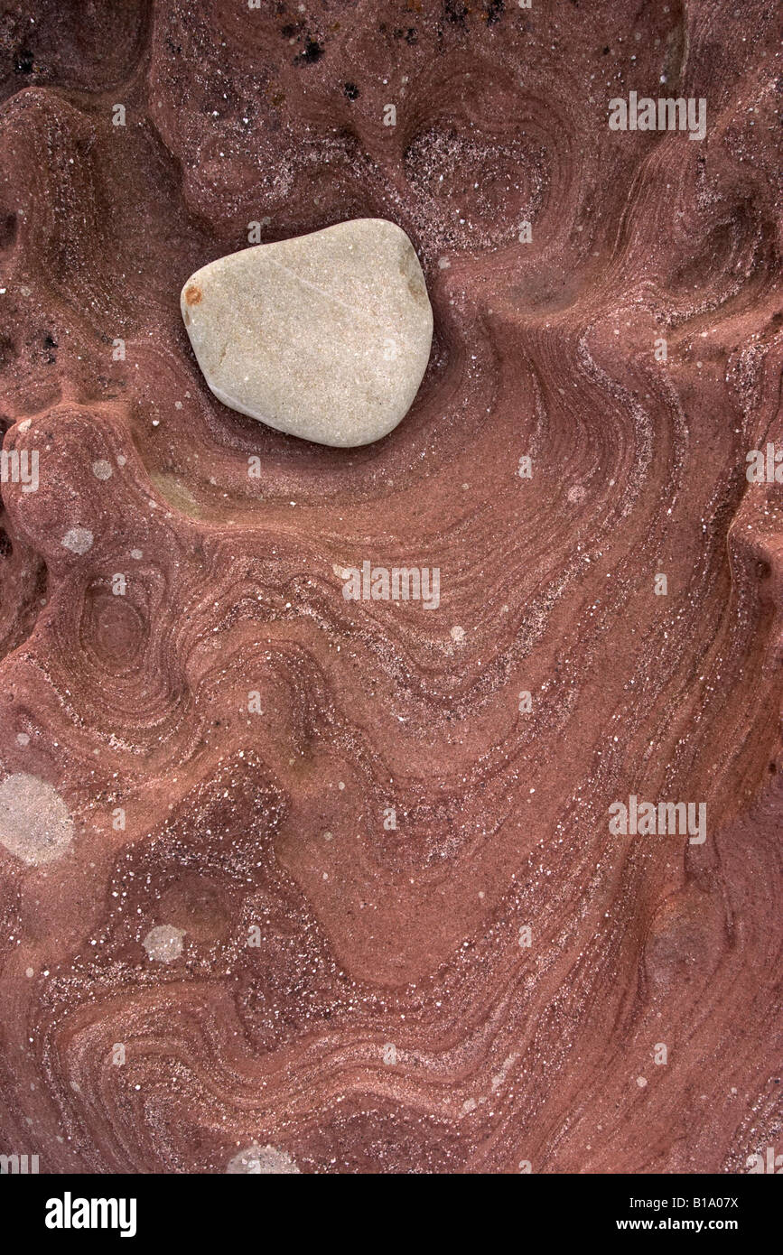 Rock Sculpture - red stone with white pebble - close up Stock Photo - Alamy