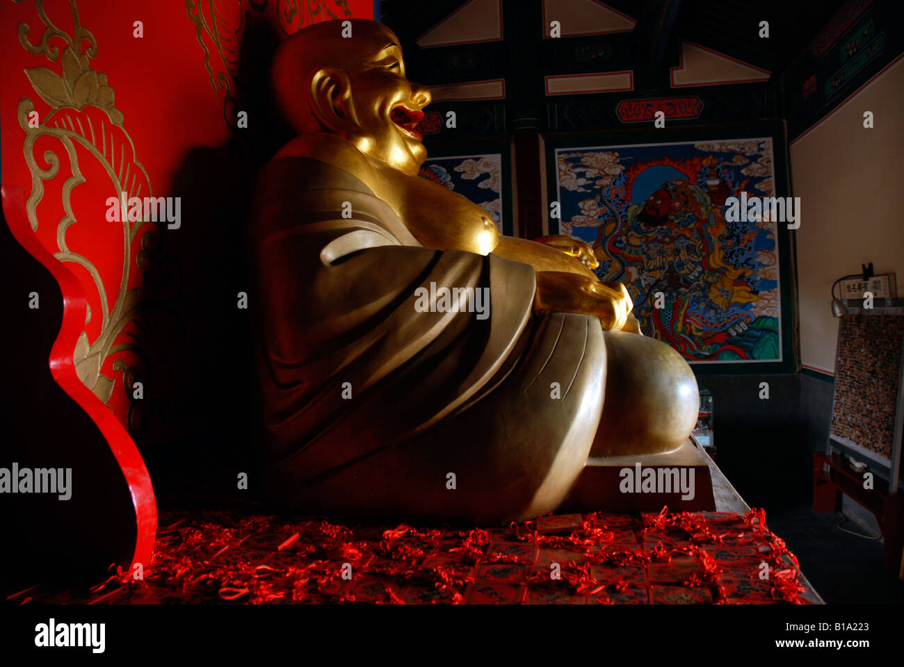Smiling Buddha statue in Beihai Park Beijing Stock Photo - Alamy