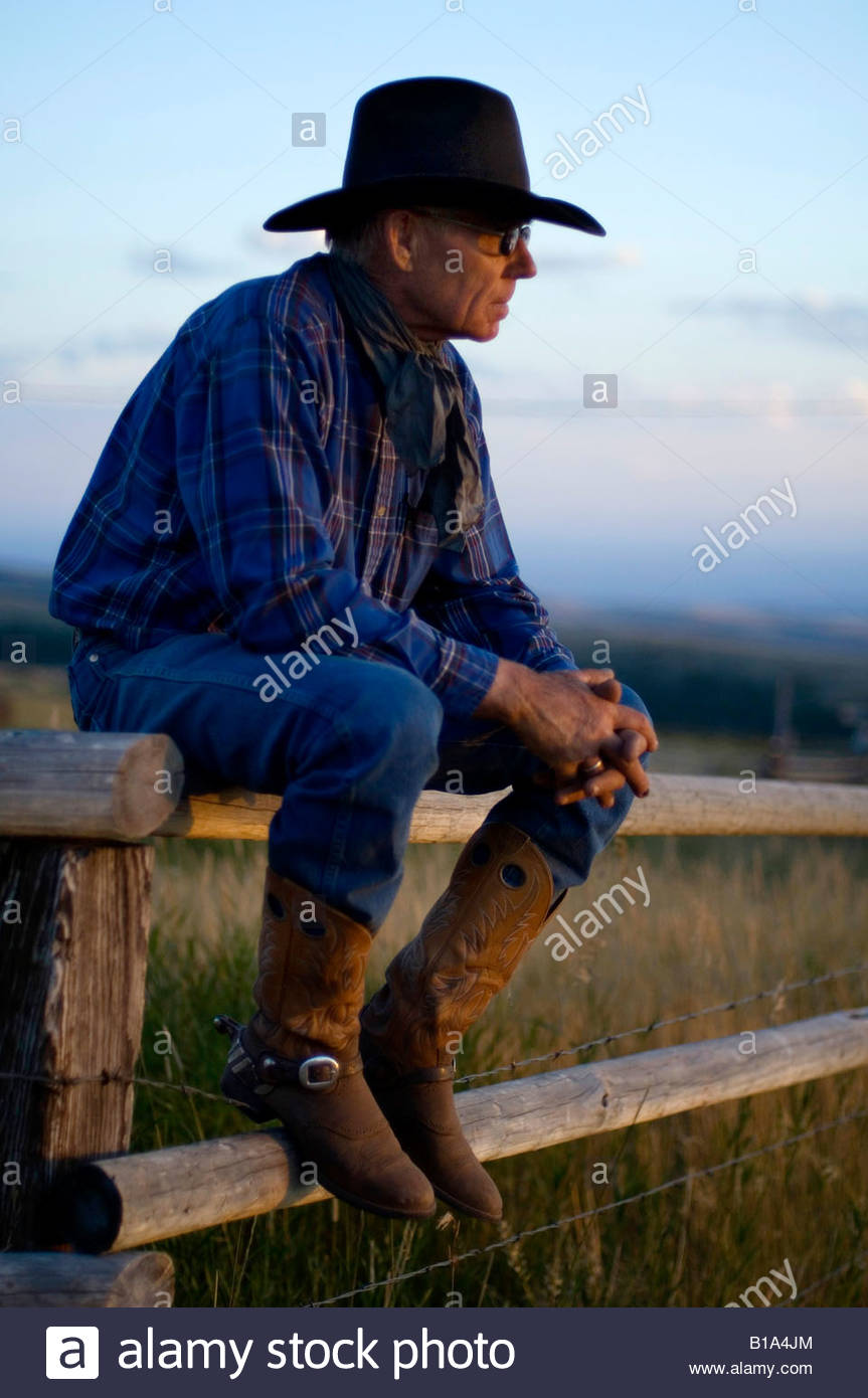 Cowboys On Fence Stock Photos & Cowboys On Fence Stock Images - Alamy