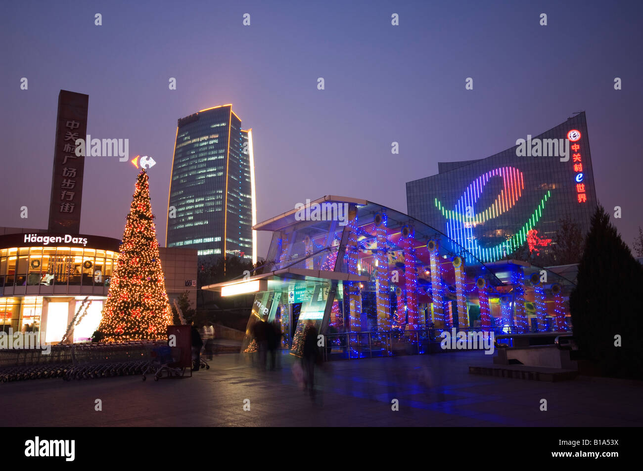 Christmas tree and decorations illuminated at night in Beijing China ...
