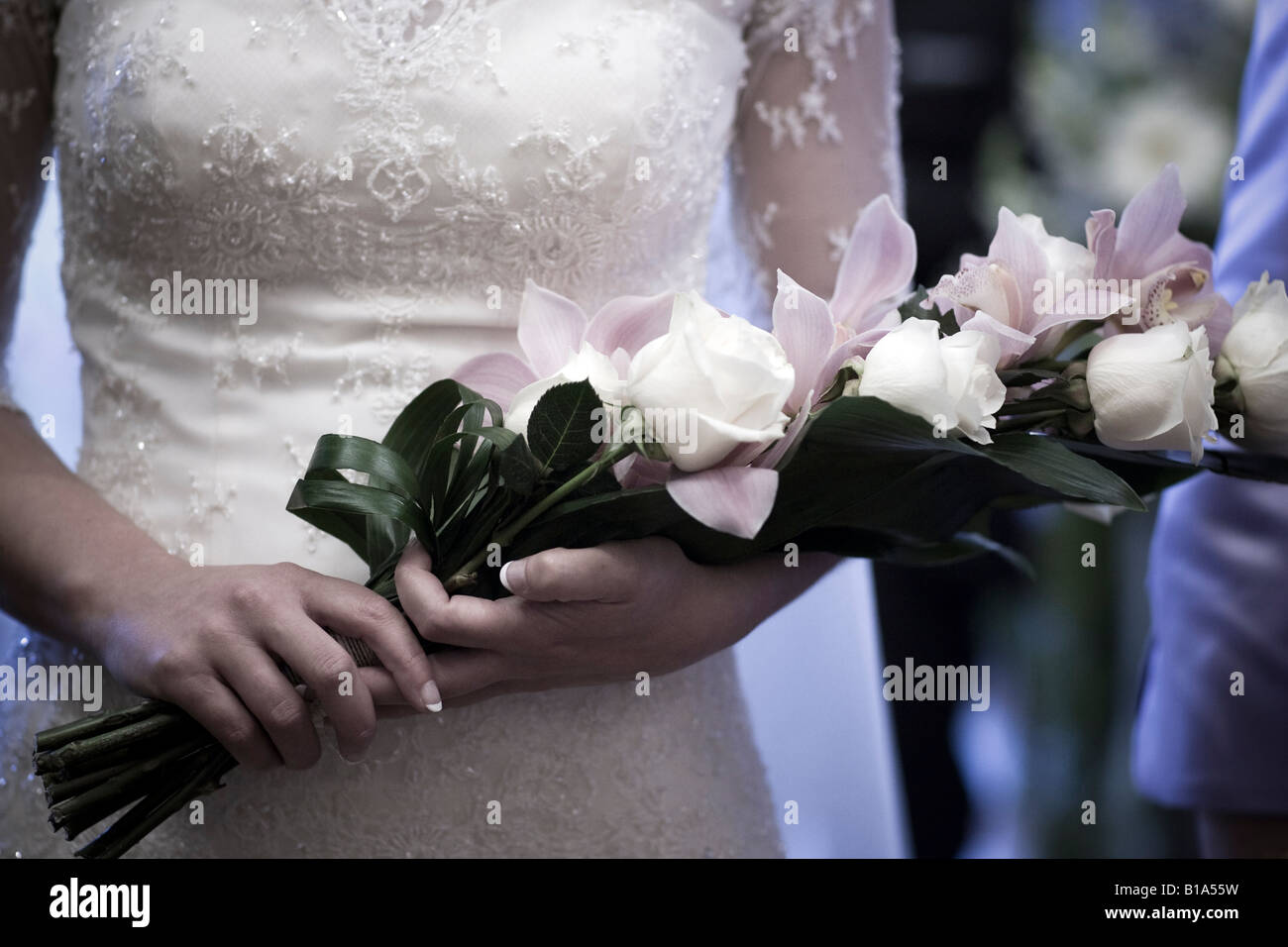 Bride holding a wedding bouquet, Seville, Spain Stock Photo - Alamy