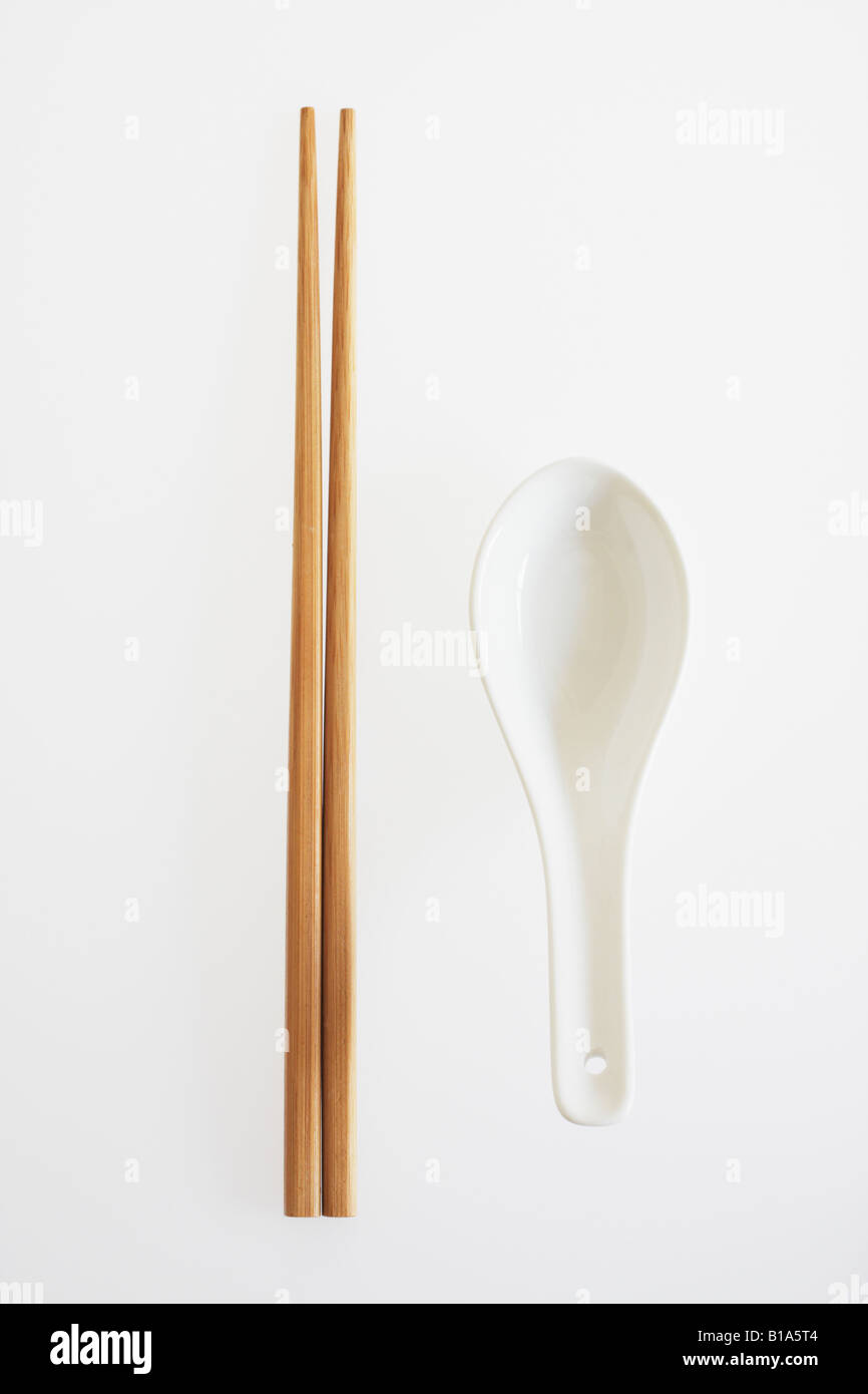 Chinese Soup Spoon With Chopsticks Stock Photo - Alamy