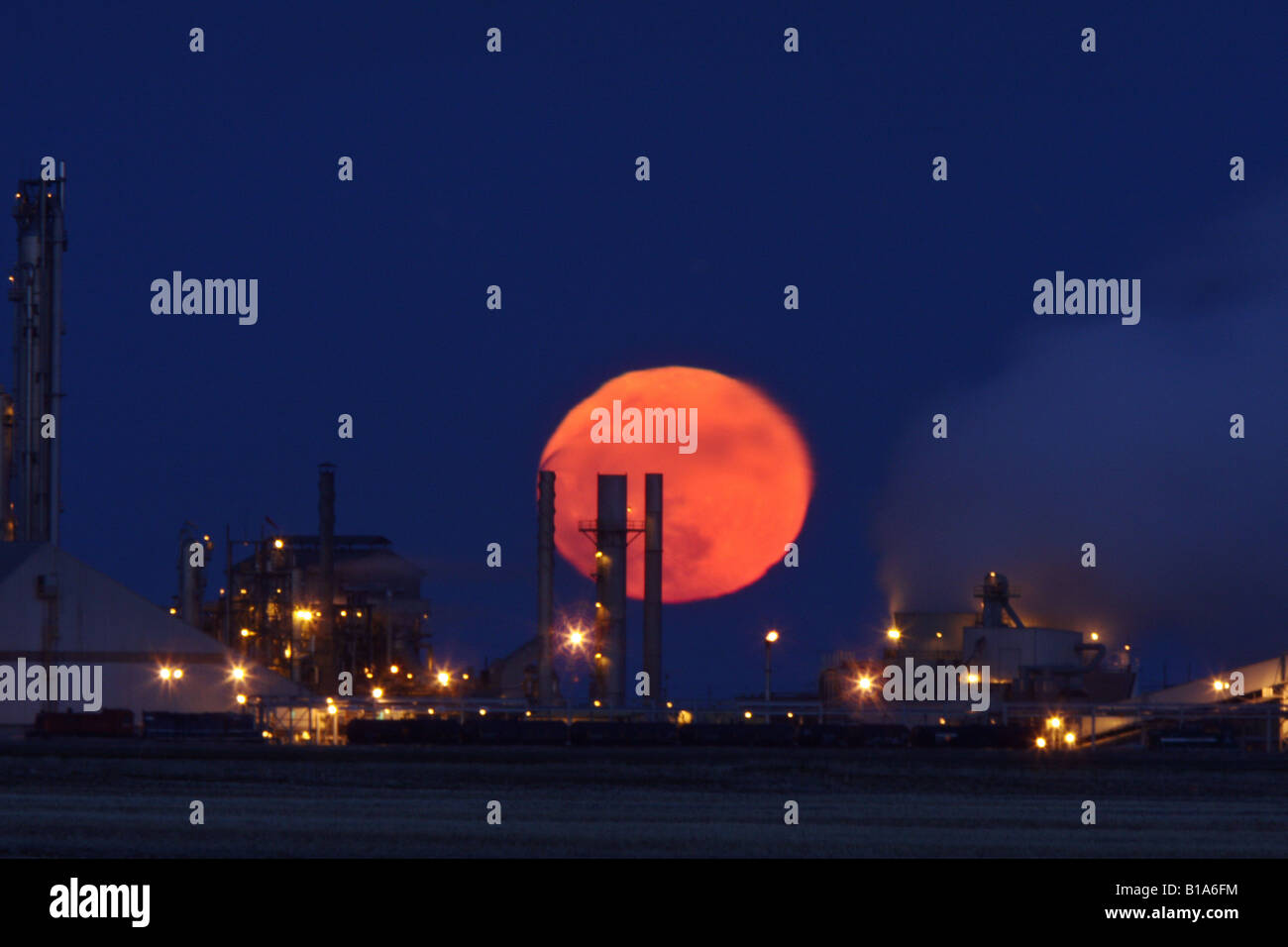 Full moon behind Saskferco potash plant refinery Stock Photo - Alamy
