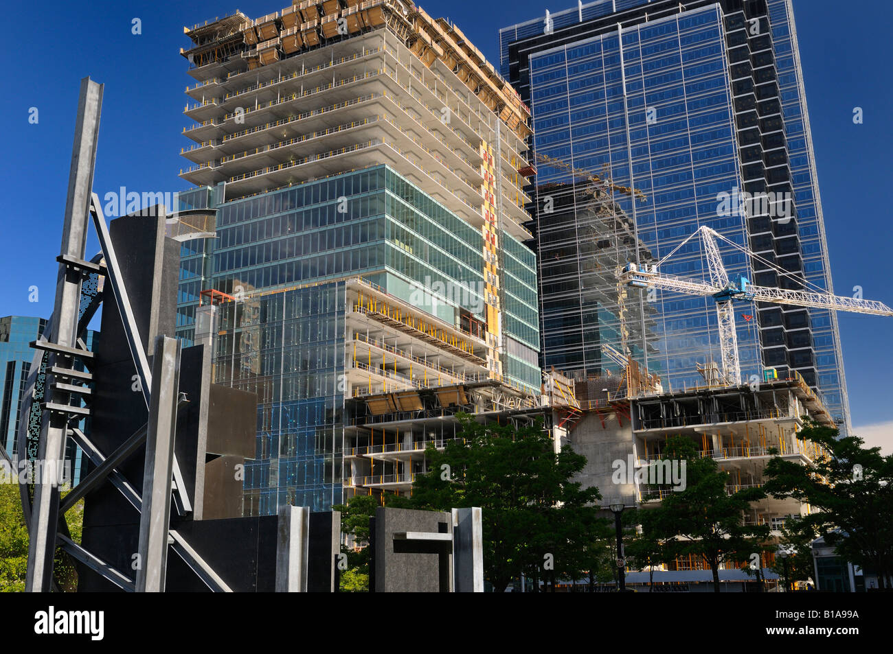 Metro Hall sculpture with RBC Center construction at Simcoe Place ...