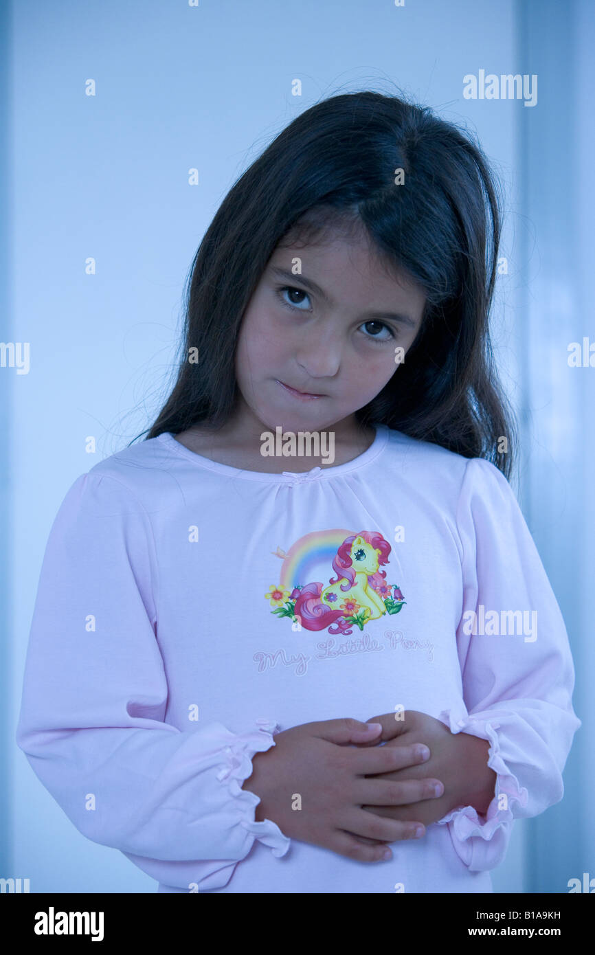 Little girl with stomach ache Stock Photo - Alamy