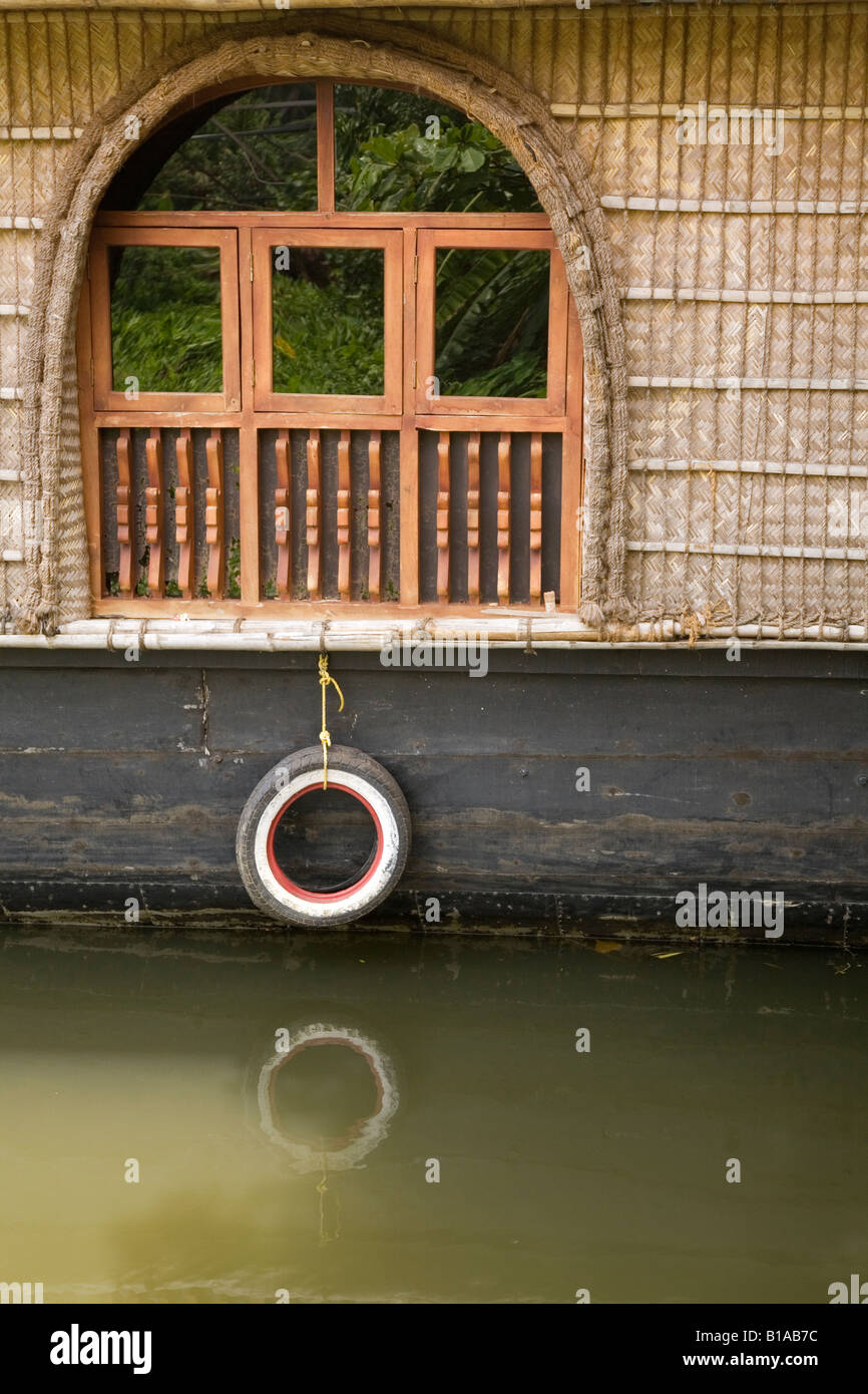 The window of a houseboat on one of the canals near to Alappuzha in ...