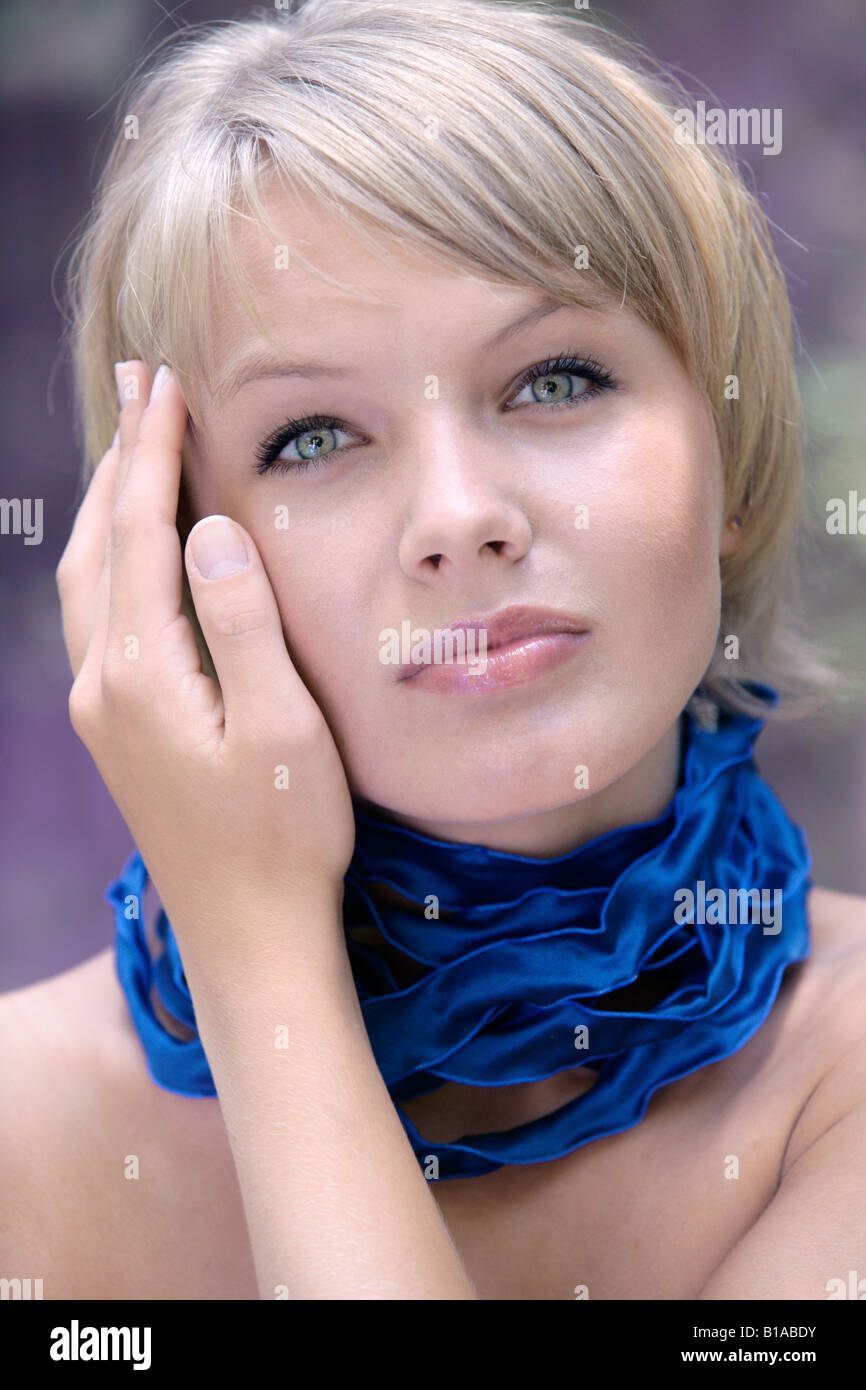 Portrait of young woman with ribbon around her neck Stock Photo - Alamy